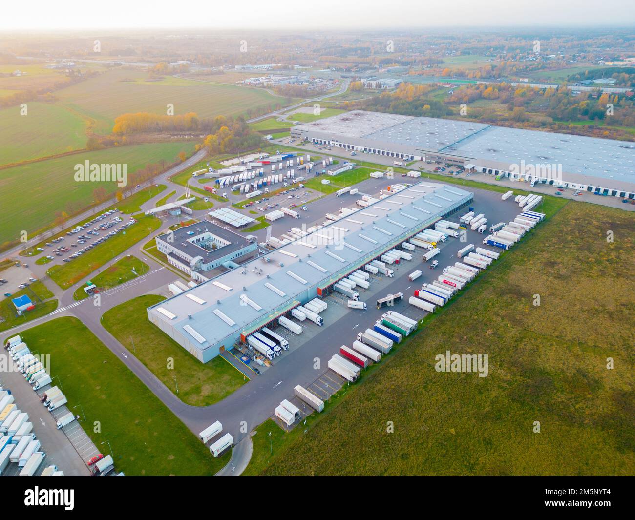 Aerial view of the logistics park with warehouse, loading hub and many ...