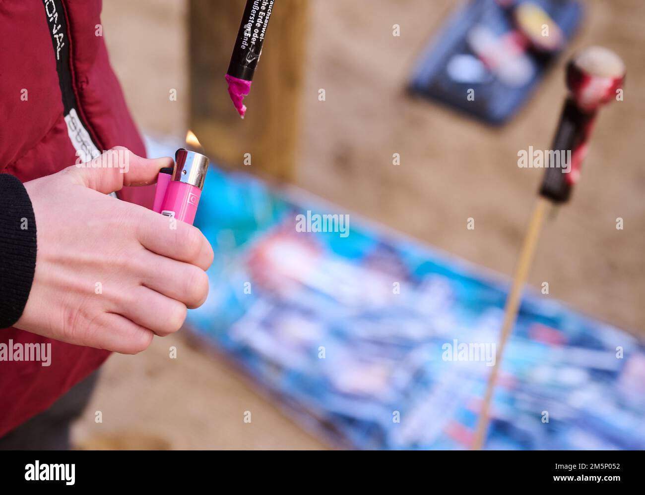 Berlin, Germany. 30th Dec, 2022. A child lights New Year's Eve ...