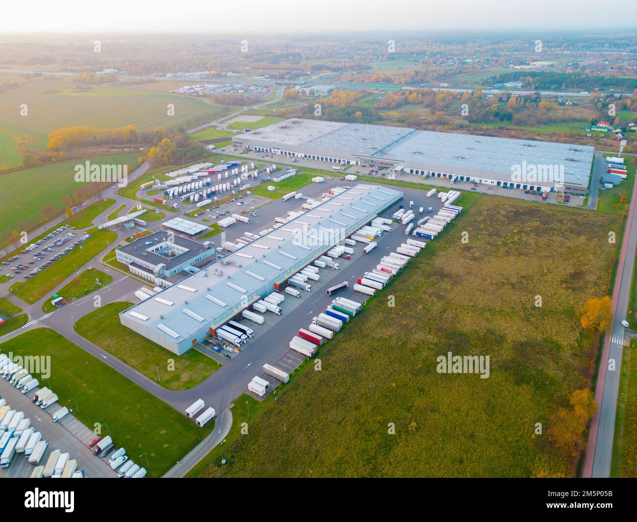 Aerial view of the logistics park with warehouse, loading hub and many ...