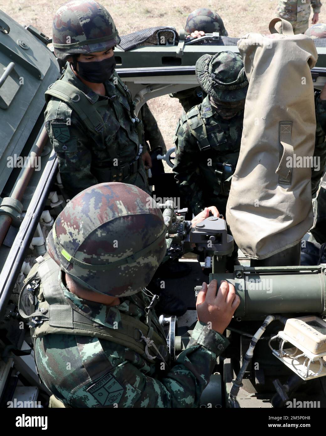 Members of the 112th Infantry Regiment, Royal Thai Army, train with the ...