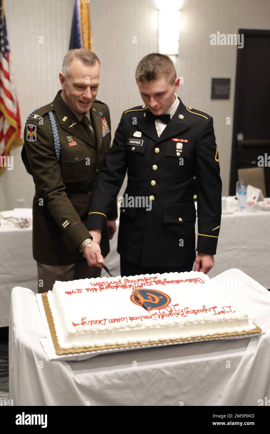U.S. Army Col. Sean Flynn and Pvt. 1st Class Austin Crapser, assigned to the headquarters of the ...