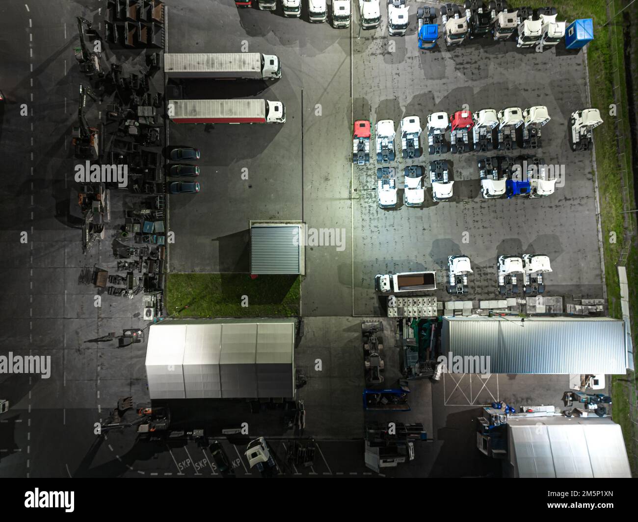 Aerial view of goods warehouse Night. Logistics center in industrial ...
