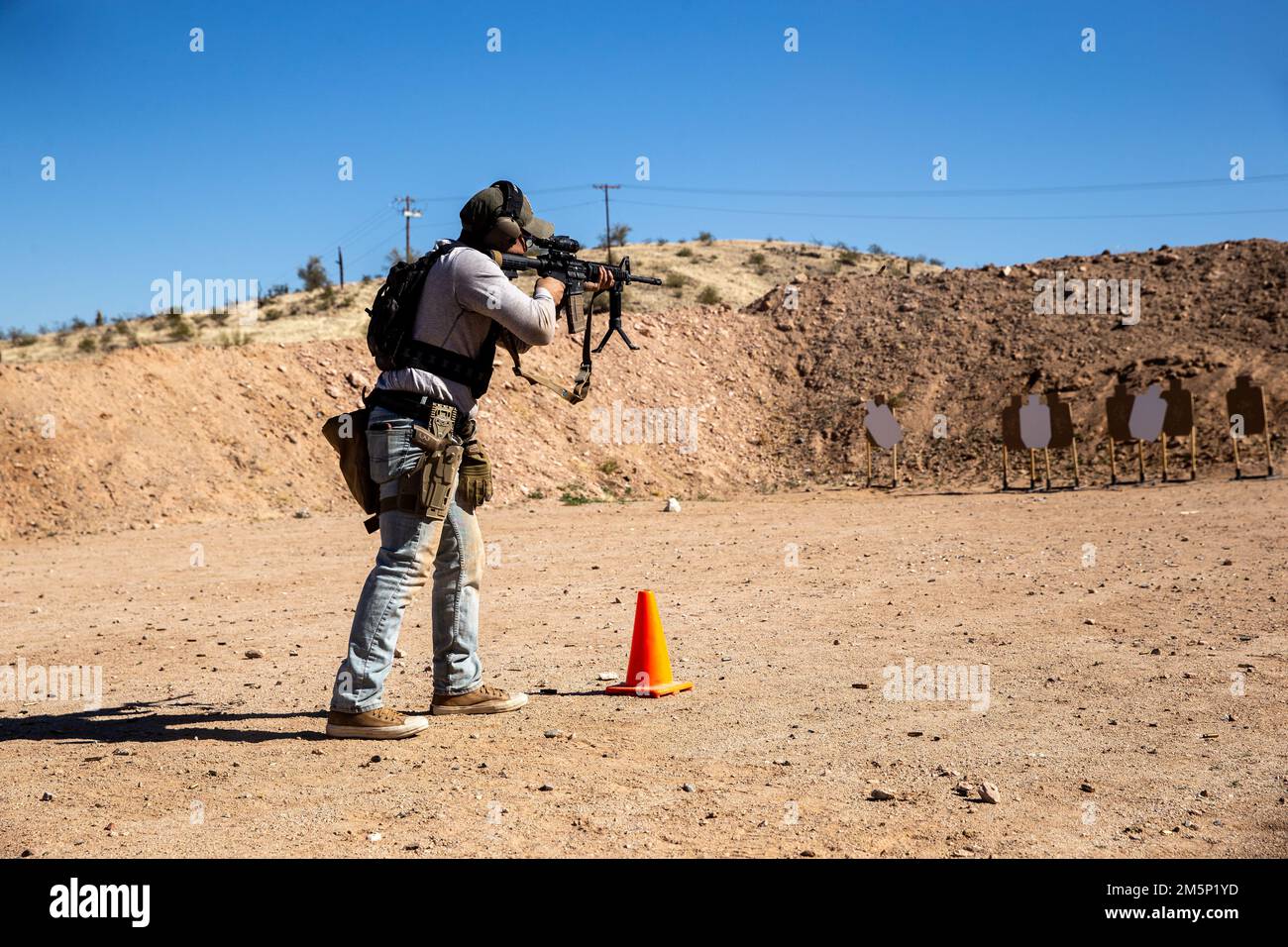 U.S. Marine Corps Lance Cpl. Eduardo Chavez, combat marksmanship coach ...