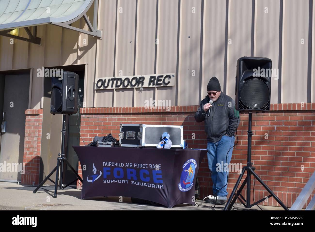 A Winter Wonderland volunteer makes an announcement at Fairchild Air ...