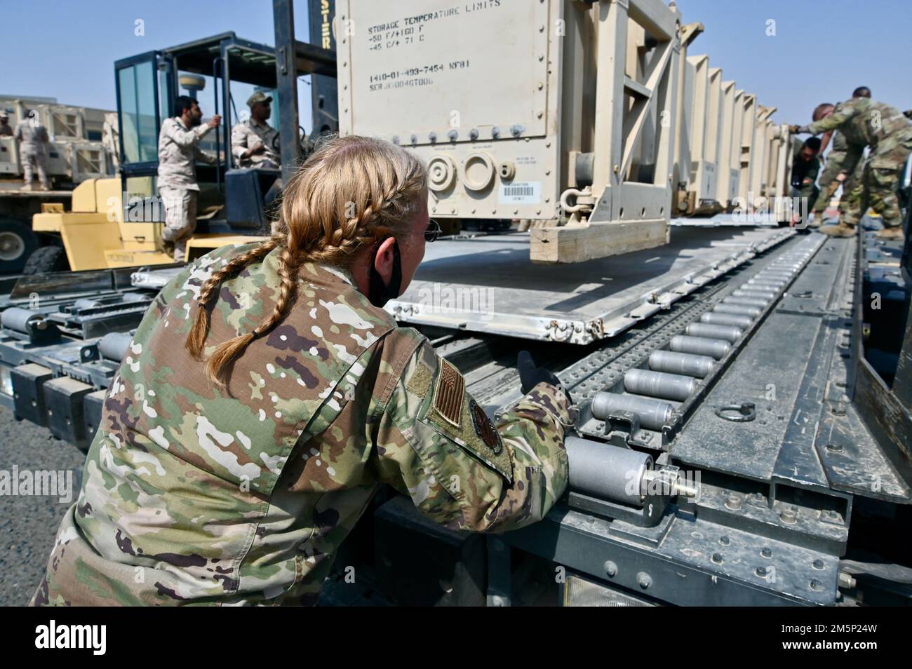 Members of the 386th Expeditionary Logistics Readiness Squadron and ...