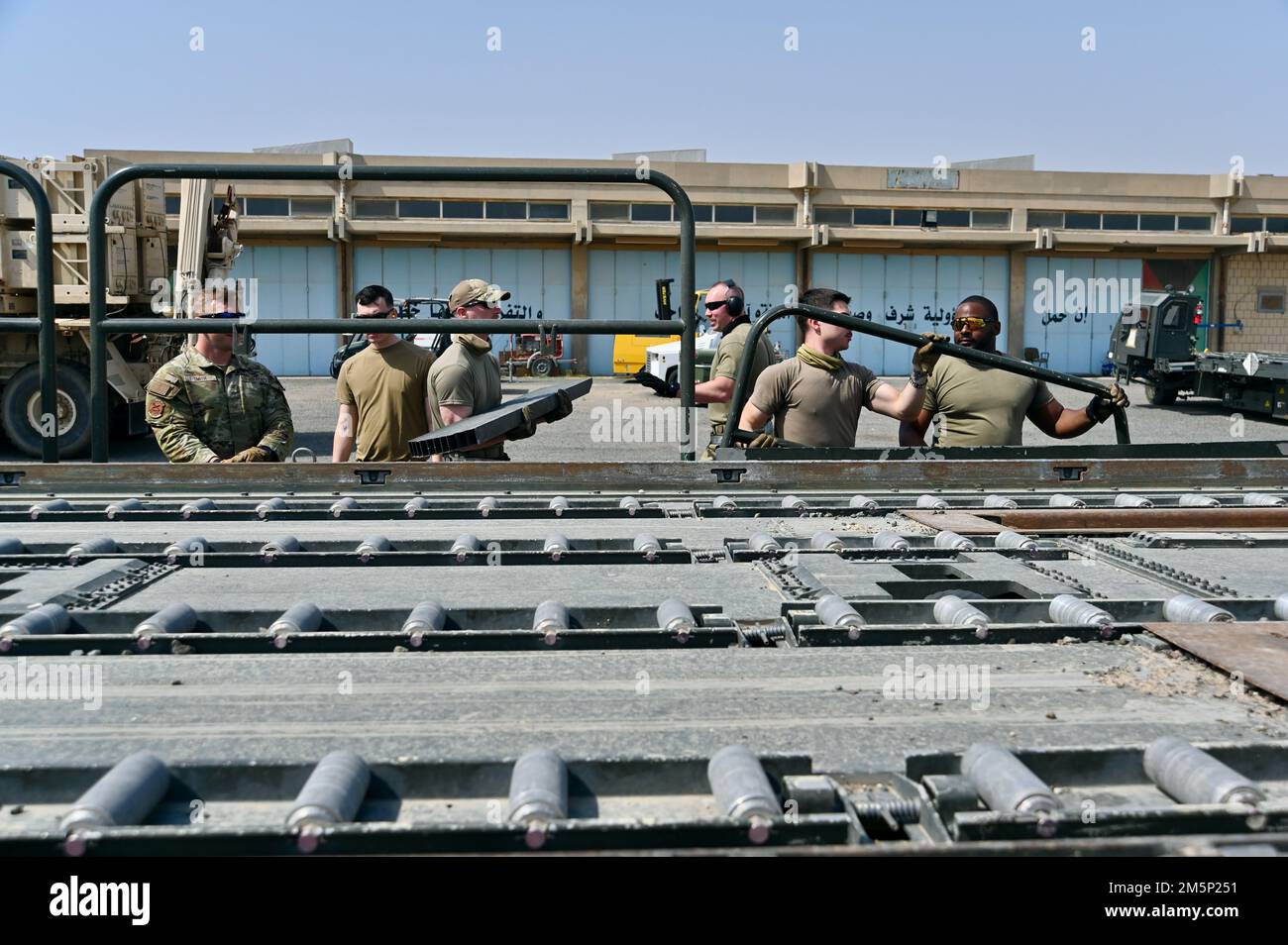 Members of the 386th Expeditionary Logistics Readiness Squadron and ...