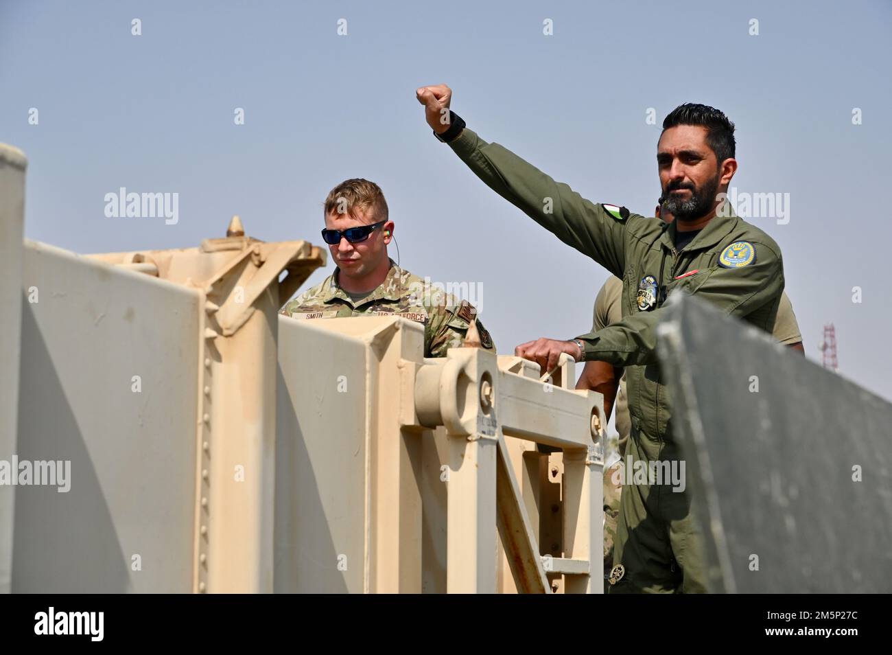 Members of the 386th Expeditionary Logistics Readiness Squadron and ...