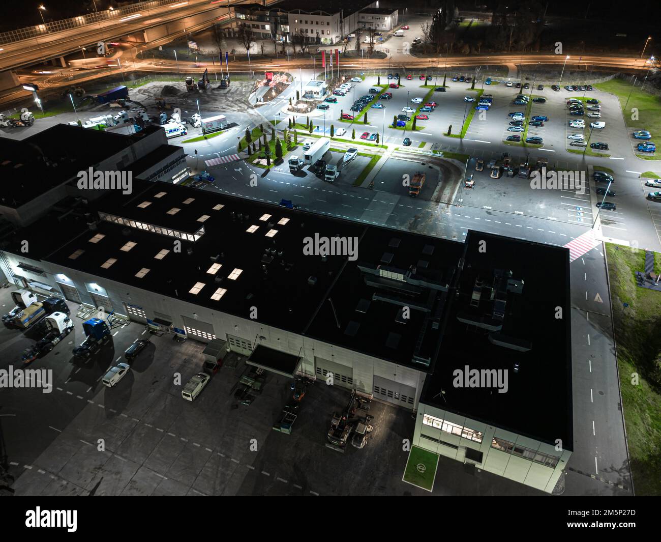Night aerial view of a warehouse of goods for online stores. Logistic ...