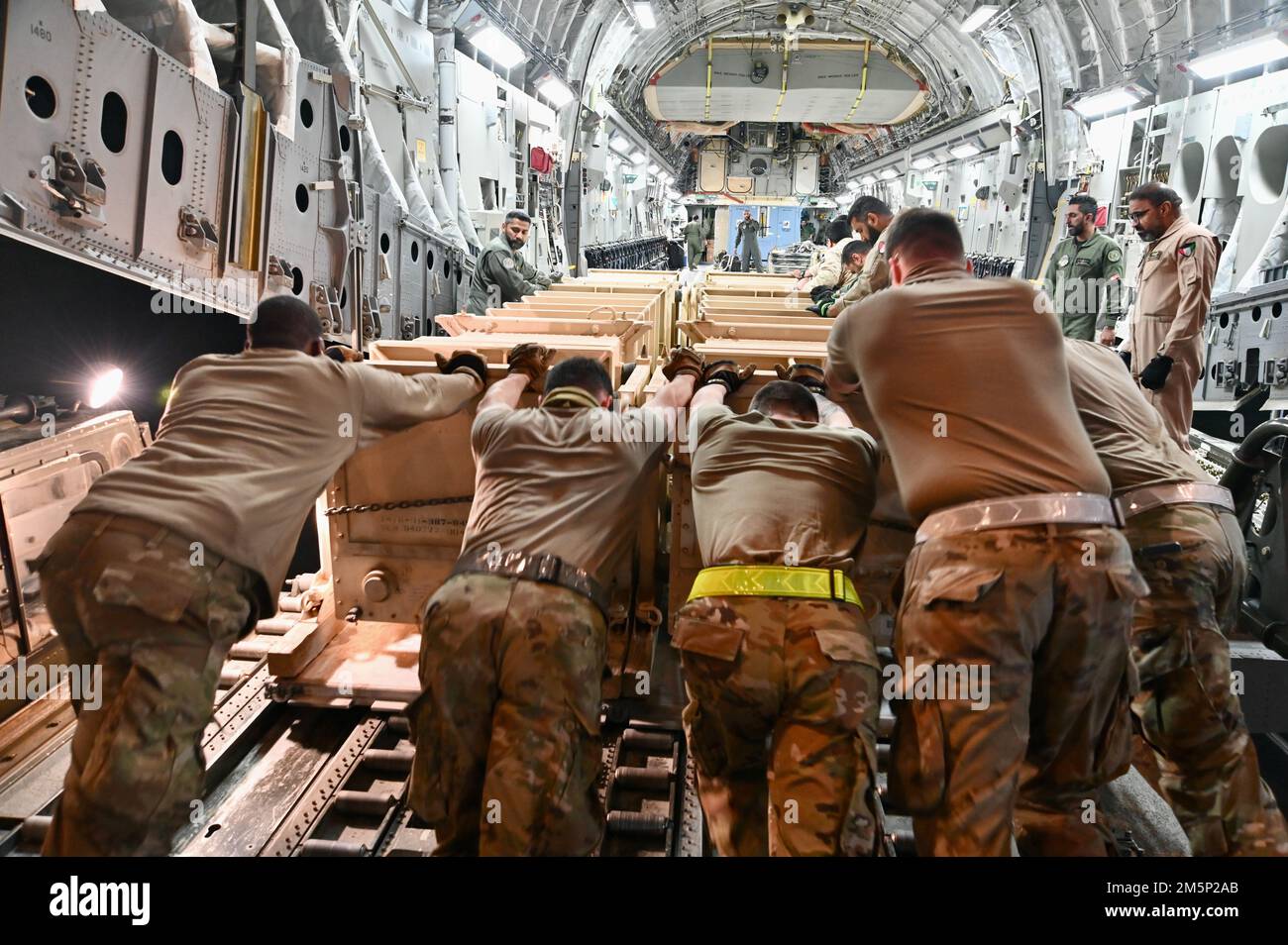 Members of the 386th Expeditionary Logistics Readiness Squadron and ...
