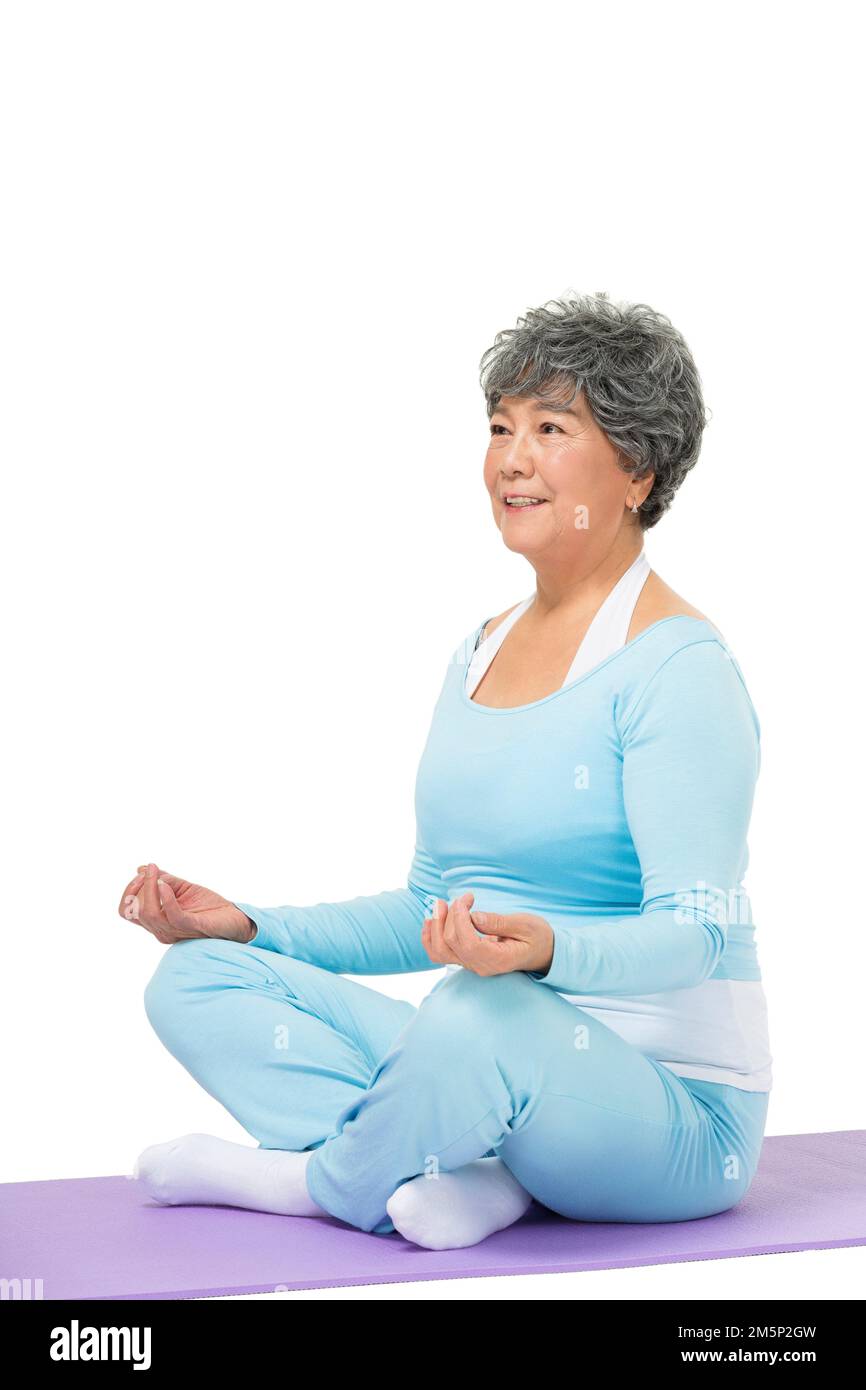 Woman sat cross legged hi-res stock photography and images - Alamy
