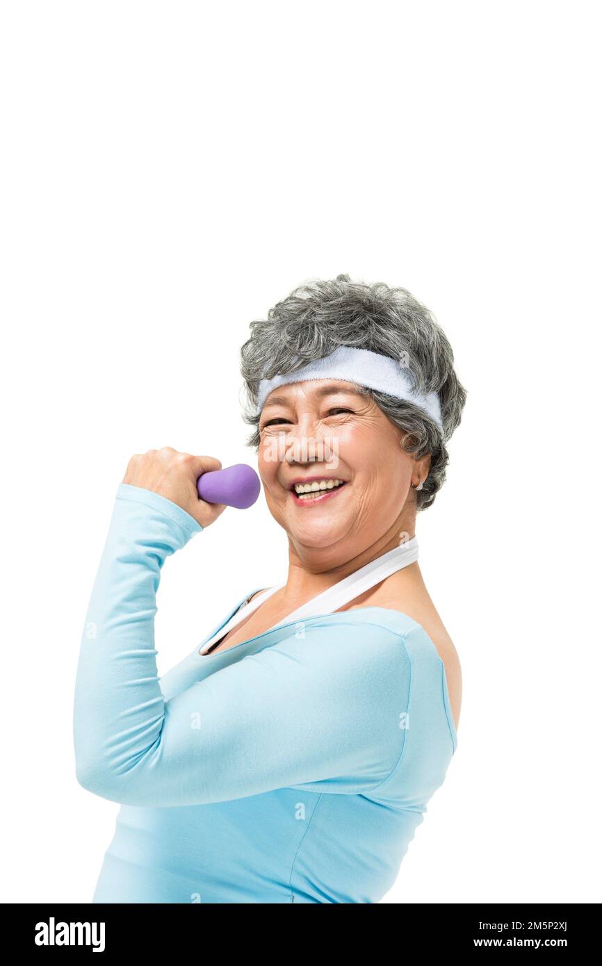 Dumbbell of the elderly Stock Photo - Alamy
