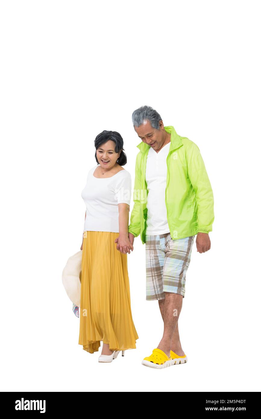 Elderly couple walking hand in hand Cut Out Stock Images & Pictures - Alamy