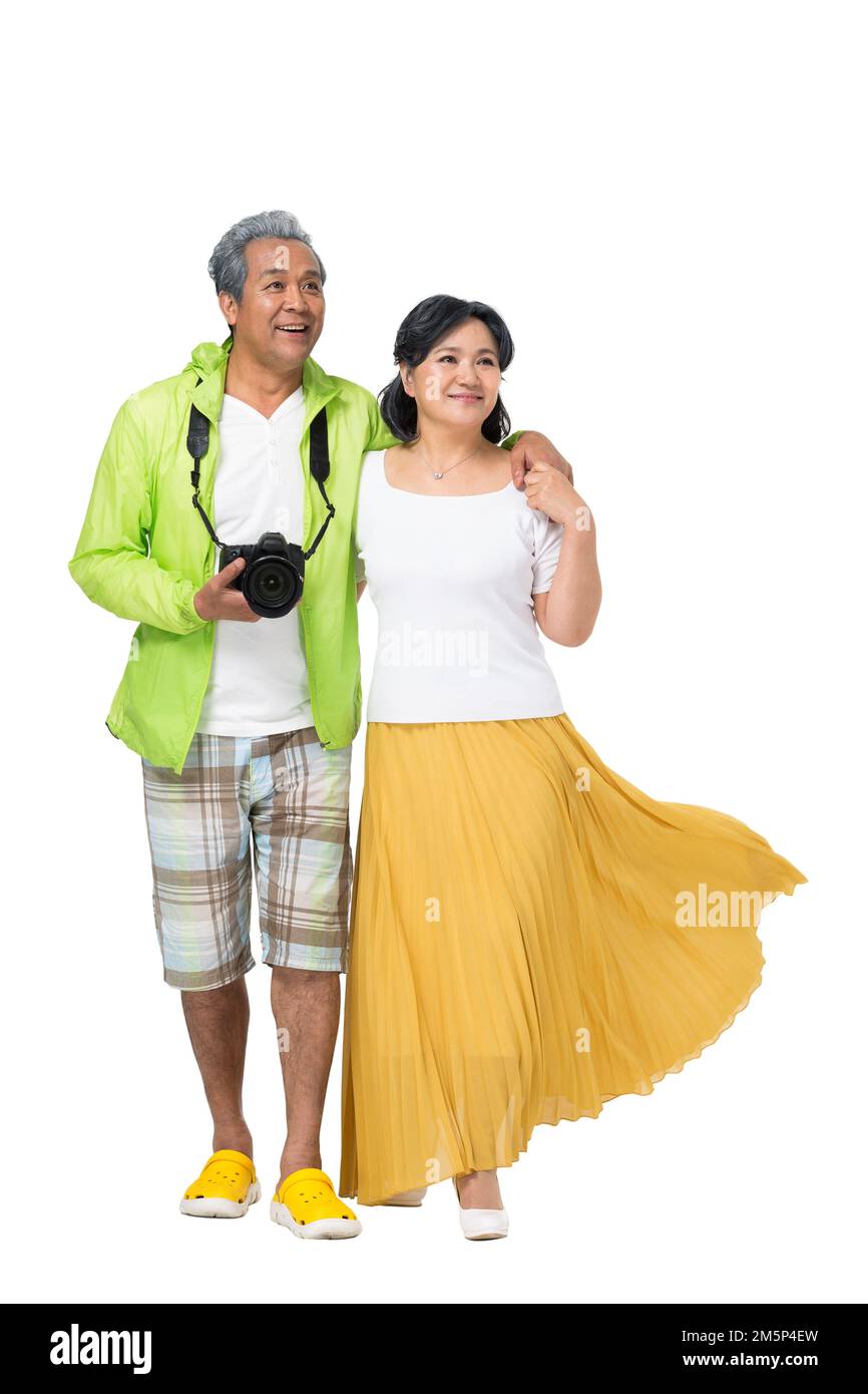 Elderly couple walking hand in hand Cut Out Stock Images & Pictures - Alamy