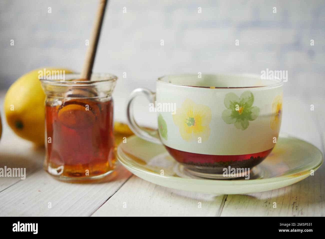 honey, lemon tea on a table Stock Photo - Alamy