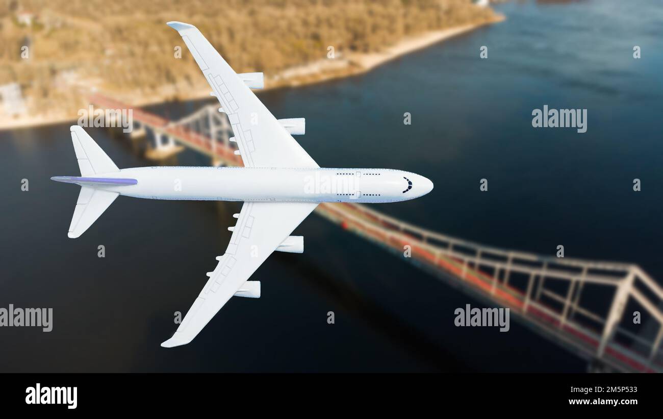 plane flies above the landscape. Side view of aircraft. Travel and ...