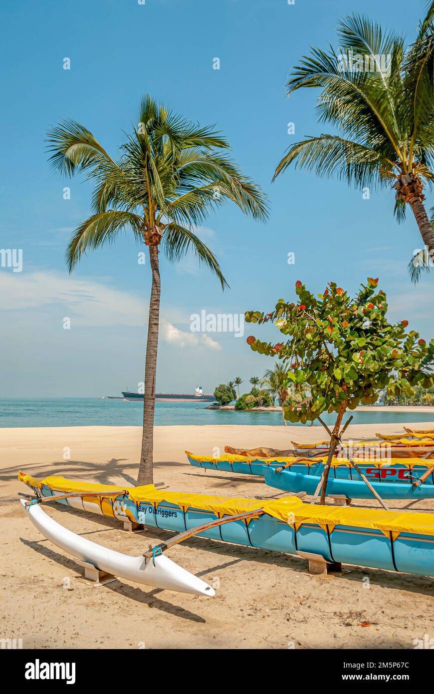 Outrigger Boats lying at the shore of Tanjong Beach, Sentosa Island ...