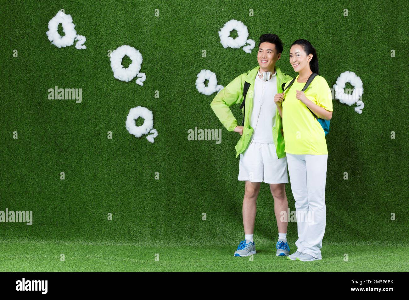 The grass creative young lovers outdoor outing Stock Photo - Alamy