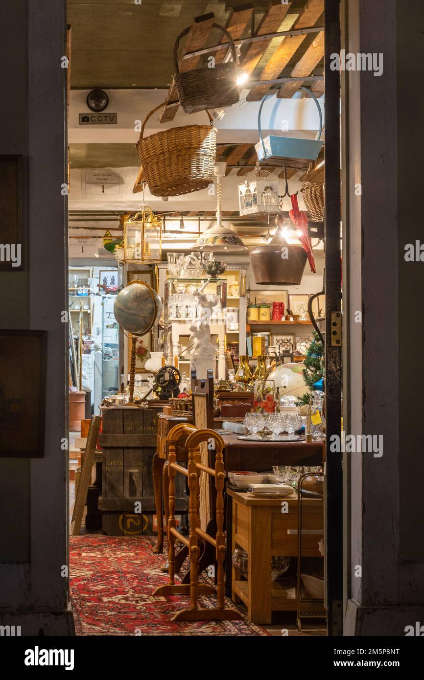 View through antiques shop doorway showing vintage, antique and craft ...
