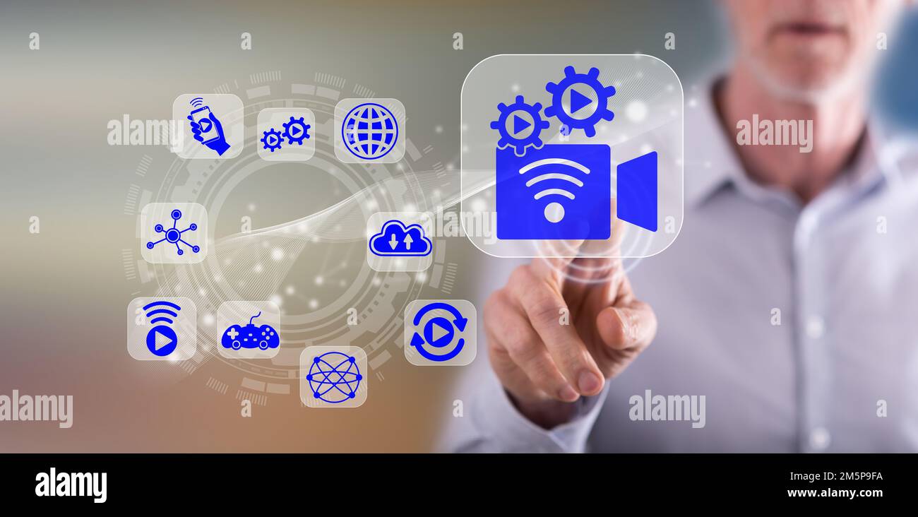 Man touching a live streaming concept on a touch screen with his finger ...