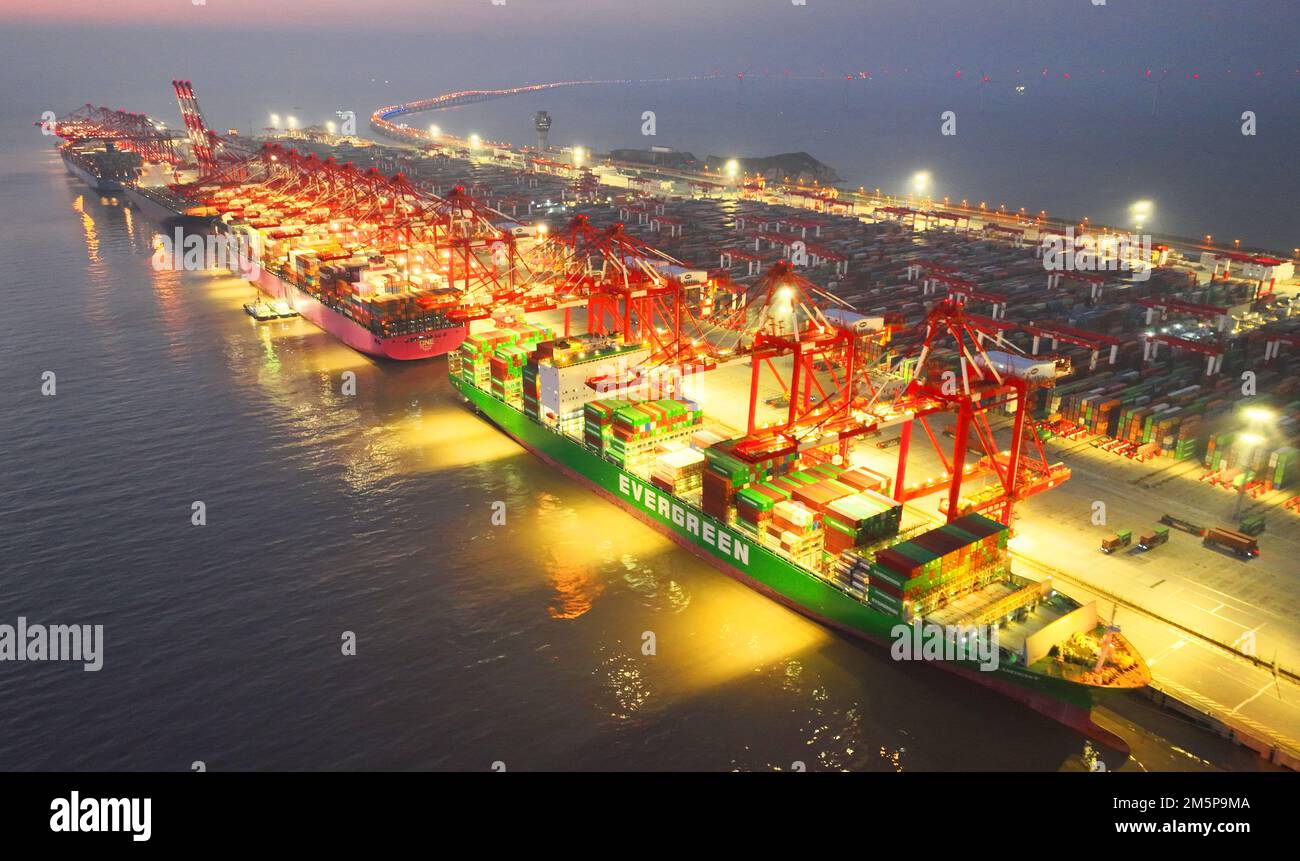 SHANGHAI, CHINA - DECEMBER 30, 2022 - An aerial photo shows the container lifting operation of ...
