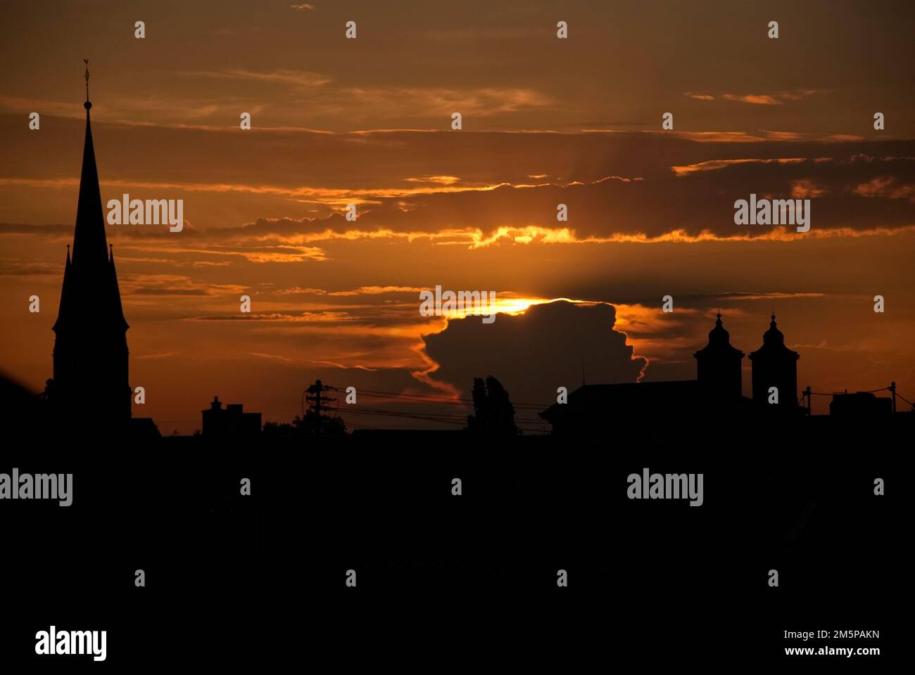 Beautiful sunsets over land and civilization Stock Photo - Alamy
