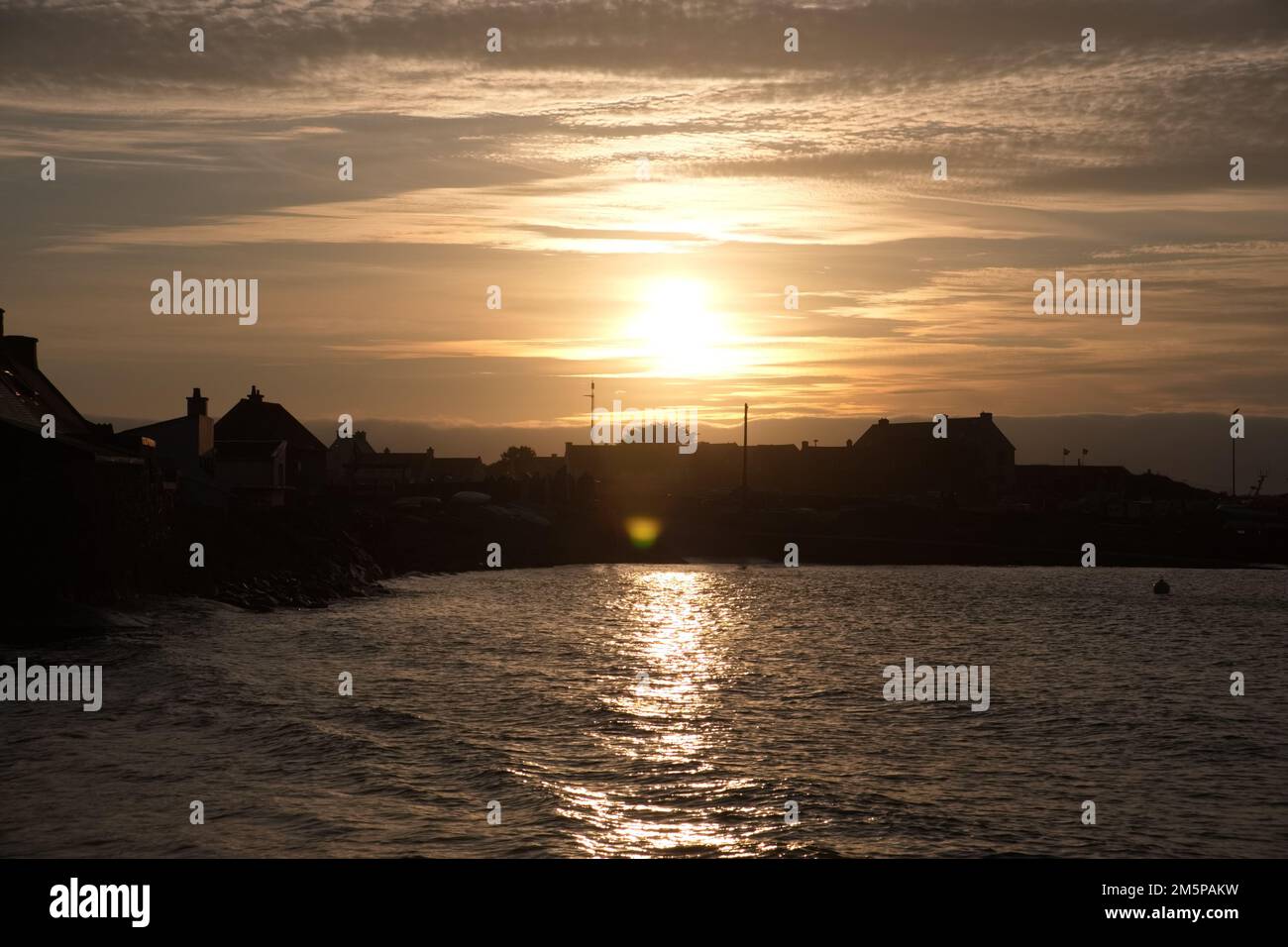 Beautiful sunsets over land and civilization Stock Photo - Alamy