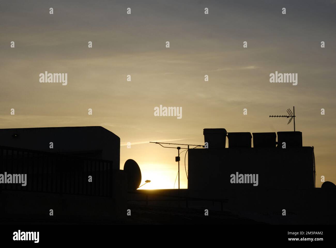 Beautiful sunsets over land and civilization Stock Photo - Alamy