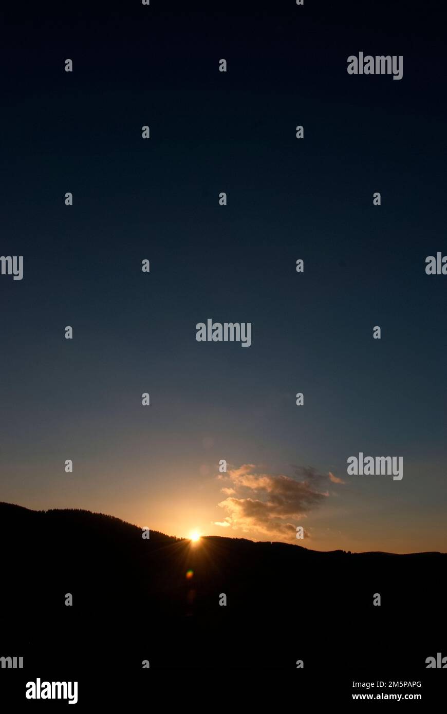 Beautiful sunsets over land and civilization Stock Photo - Alamy