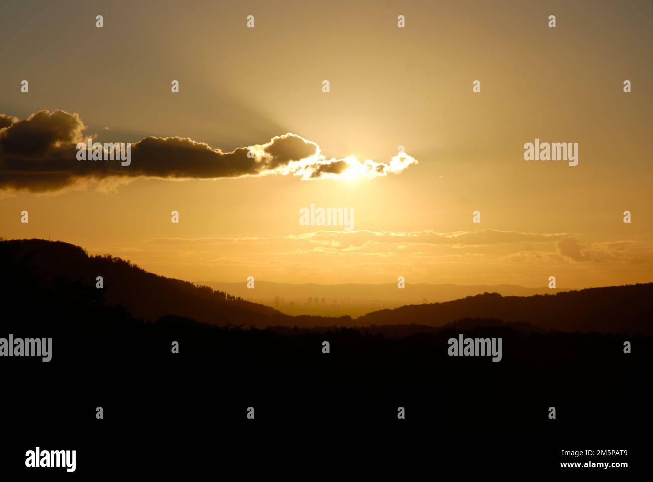 Beautiful sunsets over land and civilization Stock Photo - Alamy