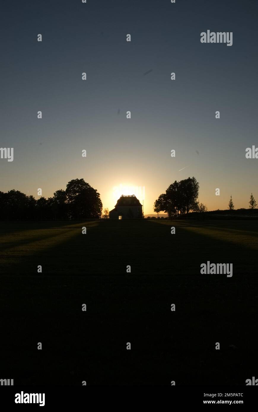 Beautiful sunsets over land and civilization Stock Photo - Alamy