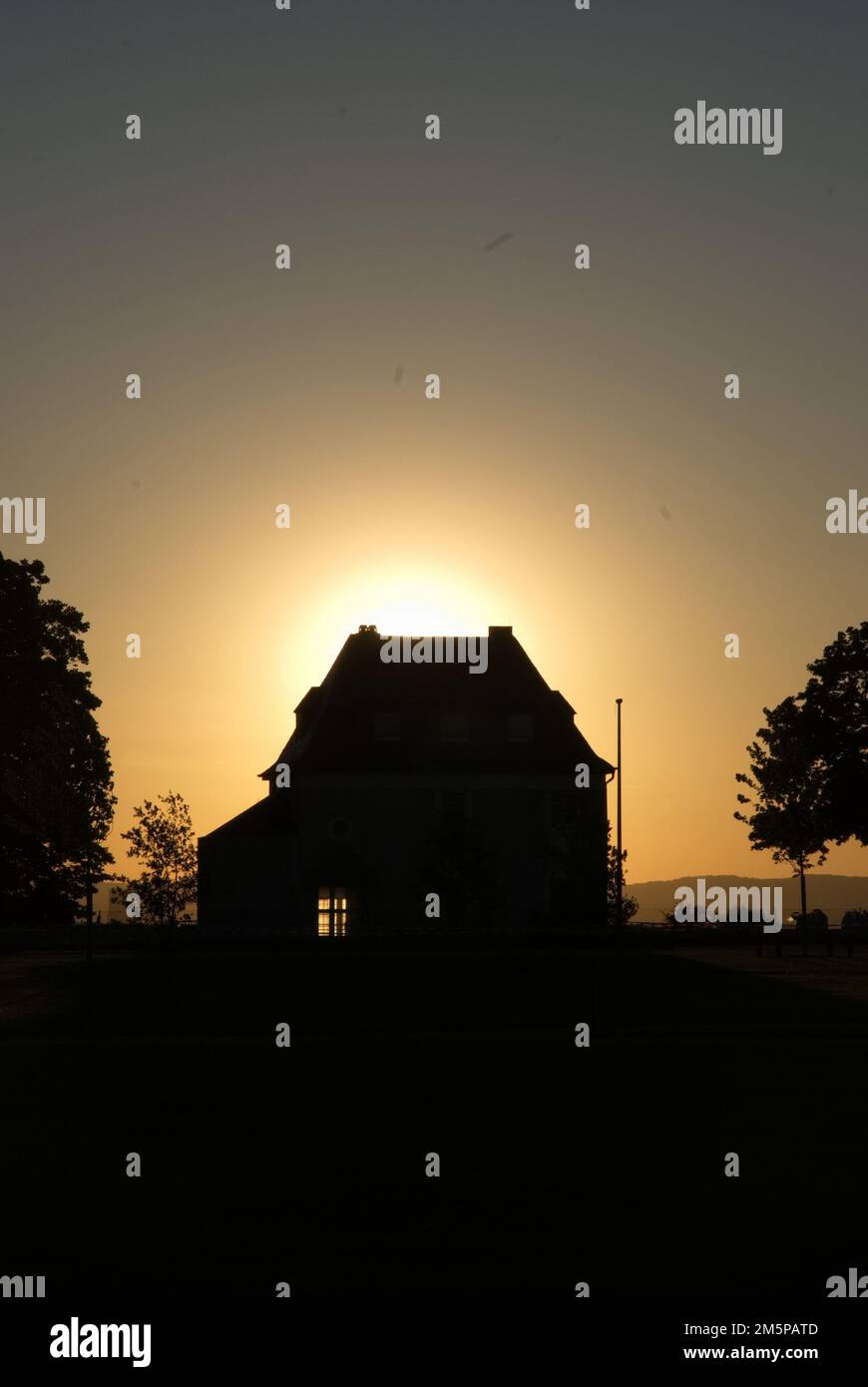 Beautiful sunsets over land and civilization Stock Photo - Alamy