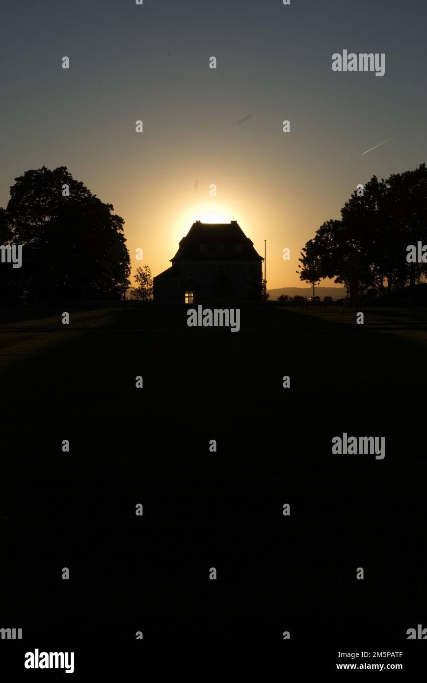 Beautiful sunsets over land and civilization Stock Photo - Alamy