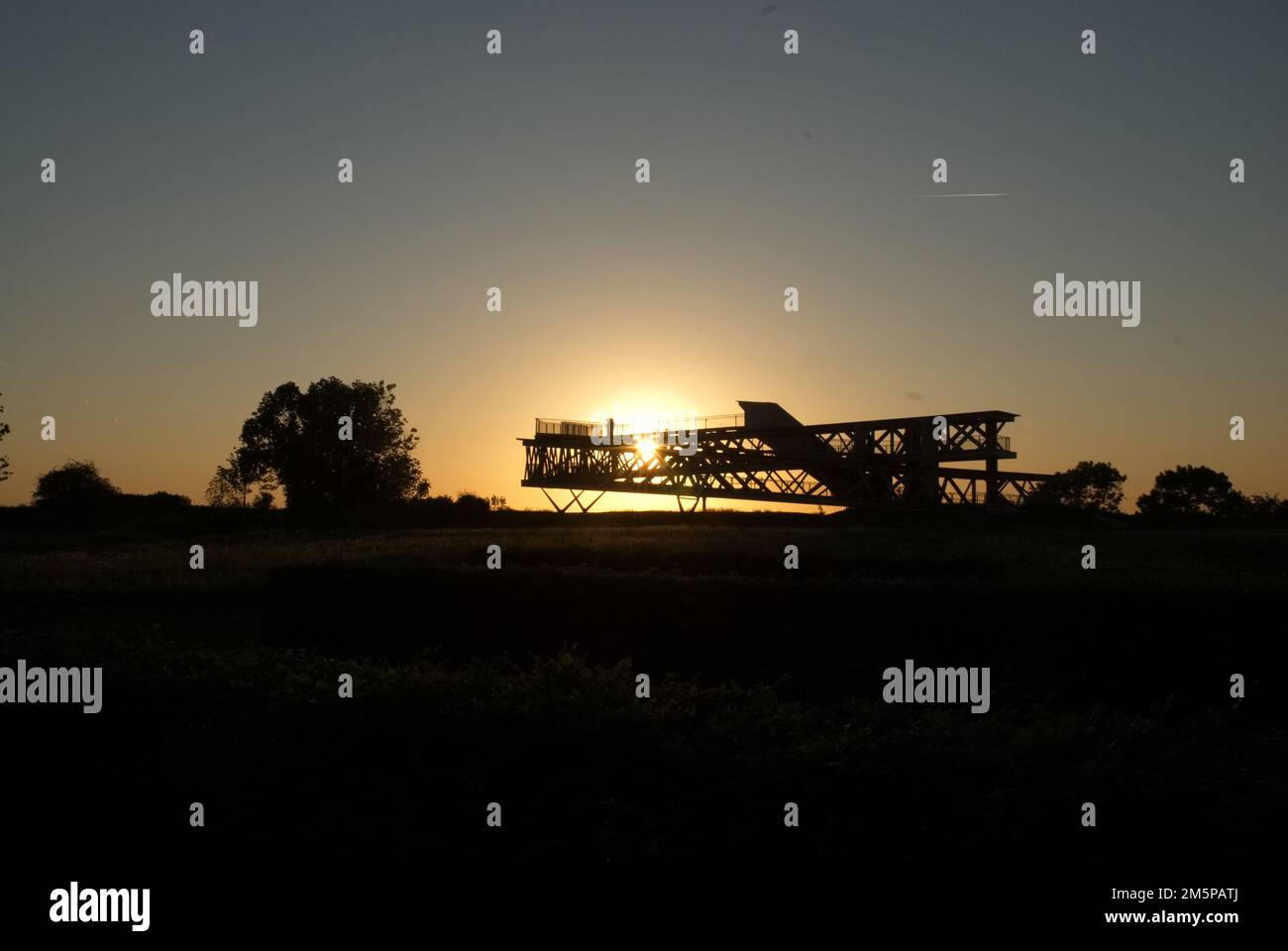 Beautiful sunsets over land and civilization Stock Photo - Alamy