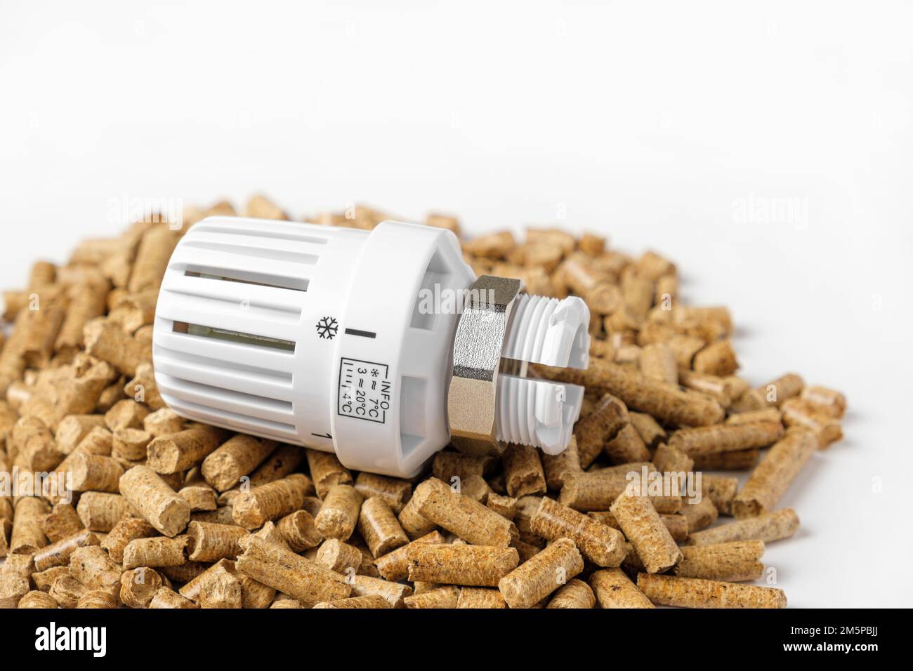 Wooden Pellets with Thermostat. Thermostatic Valve Head Isolated on ...