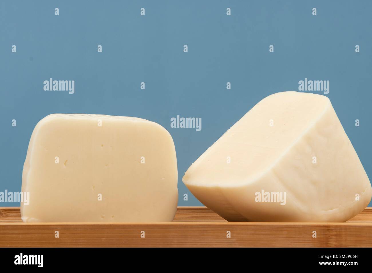 Minas half-cured cheese on a bamboo tray Stock Photo - Alamy