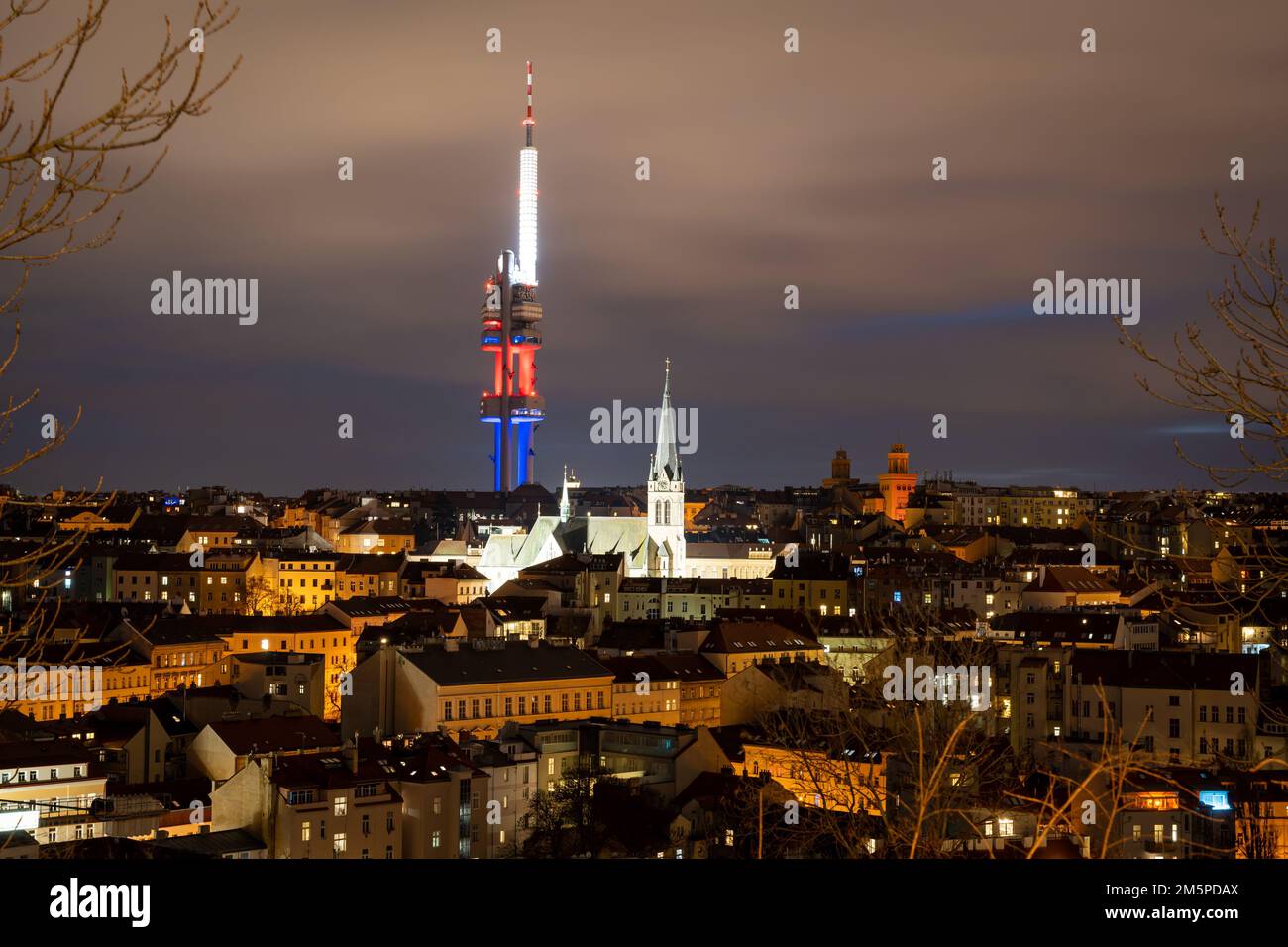 Skyline of Prague Zizkov district at night, view of the Church of Saint ...