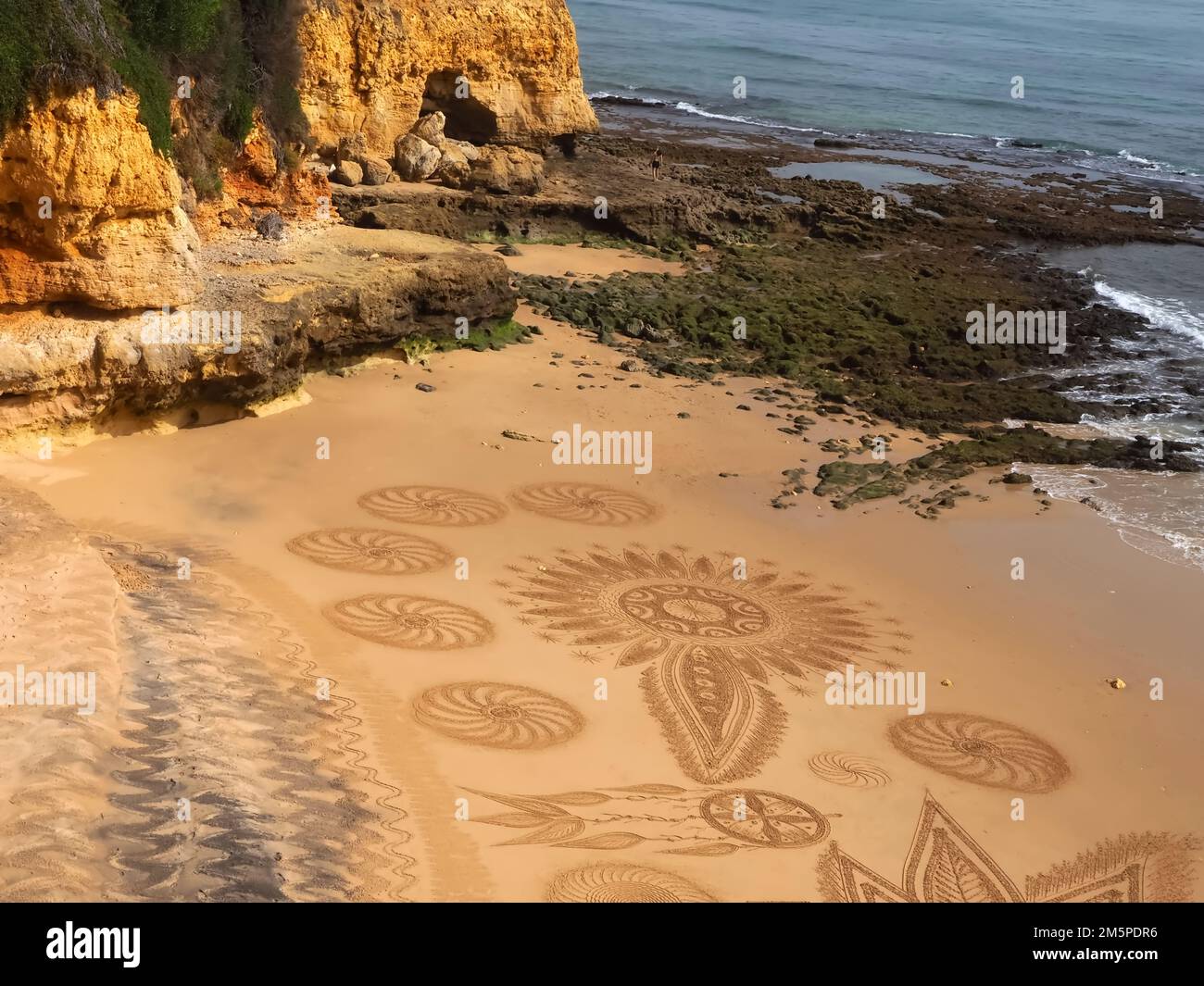 Beautiful beach sand mandala in Albufeira in Portugal Praia Maria Luisa ...