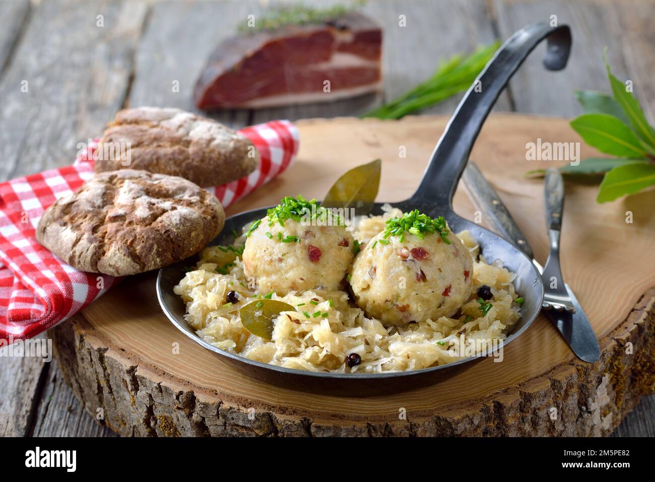Delicious South Tyrolean bacon dumplings served on sauerkraut in an ...
