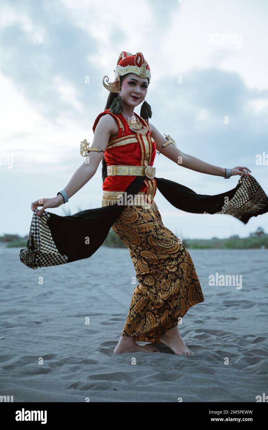 women presenting traditional Javanese dance movements Stock Photo - Alamy