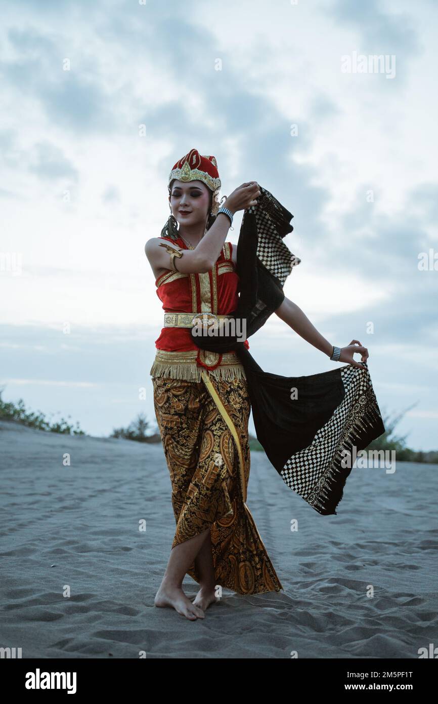 women presenting traditional Javanese dance movements Stock Photo - Alamy