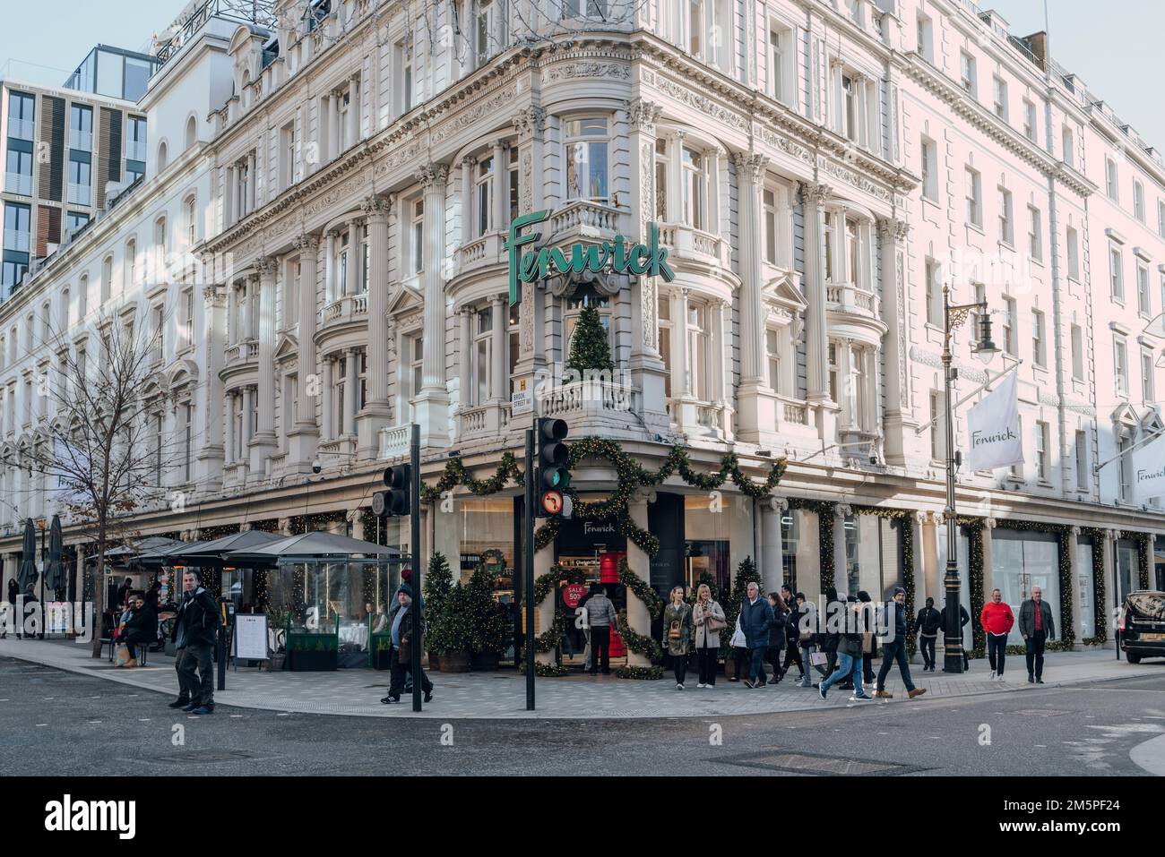 London, UK - December 26, 2022: Christmas decorated entrance of Fenwick ...