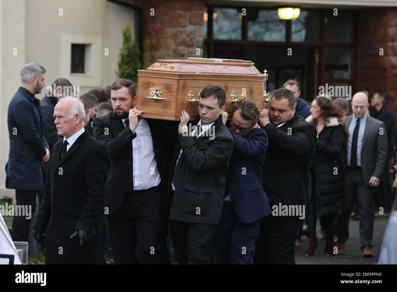The coffin of Patrick Rogers is carried from his funeral service at St ...