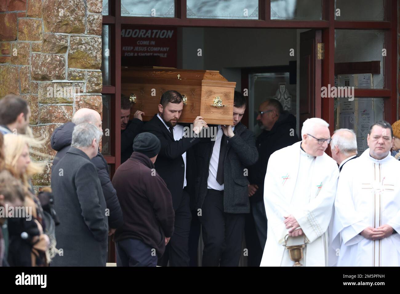 The coffin of Patrick Rogers is carried from his funeral service at St ...