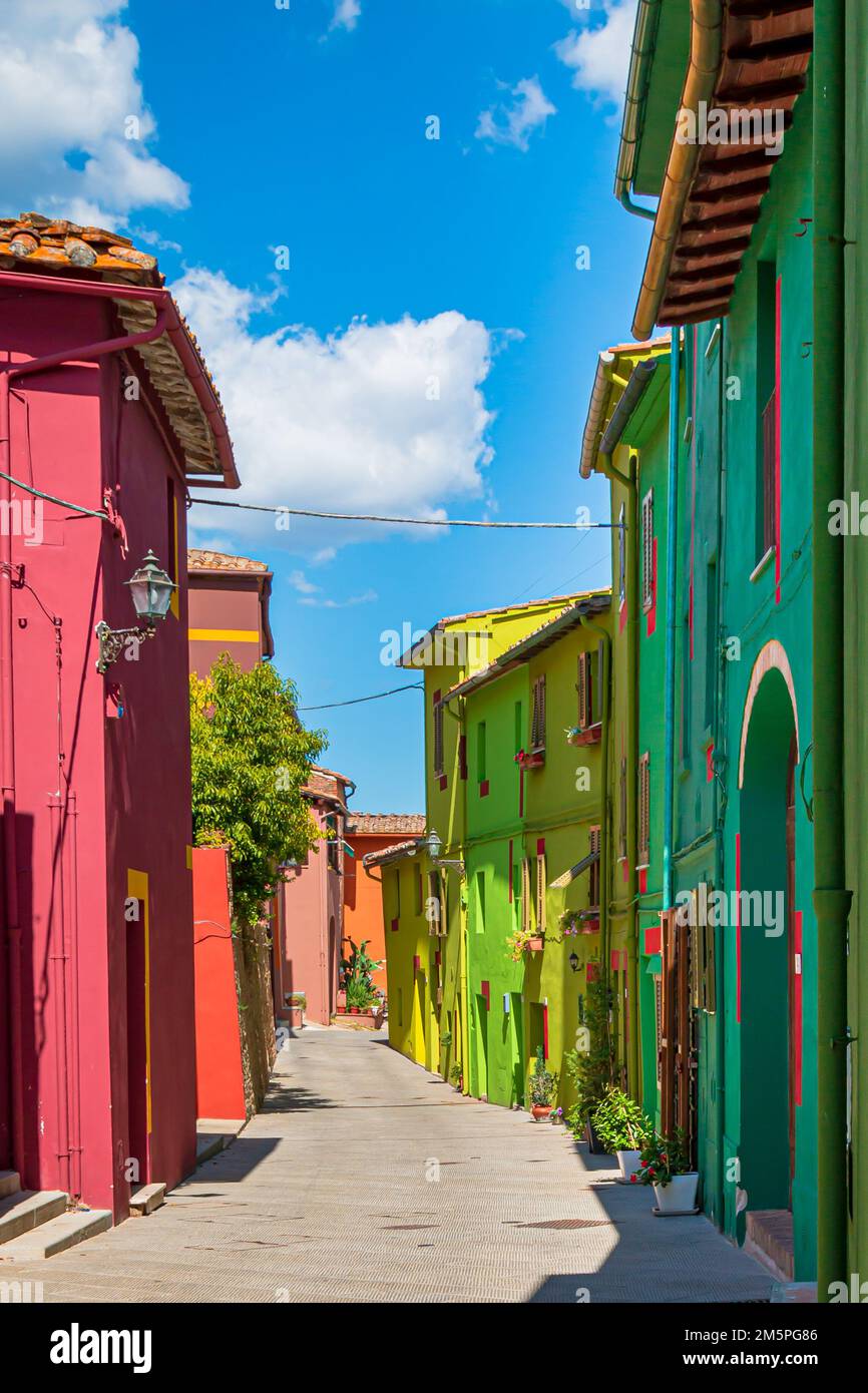 A glimpse of a the colorful main street in Ghizzano Stock Photo - Alamy
