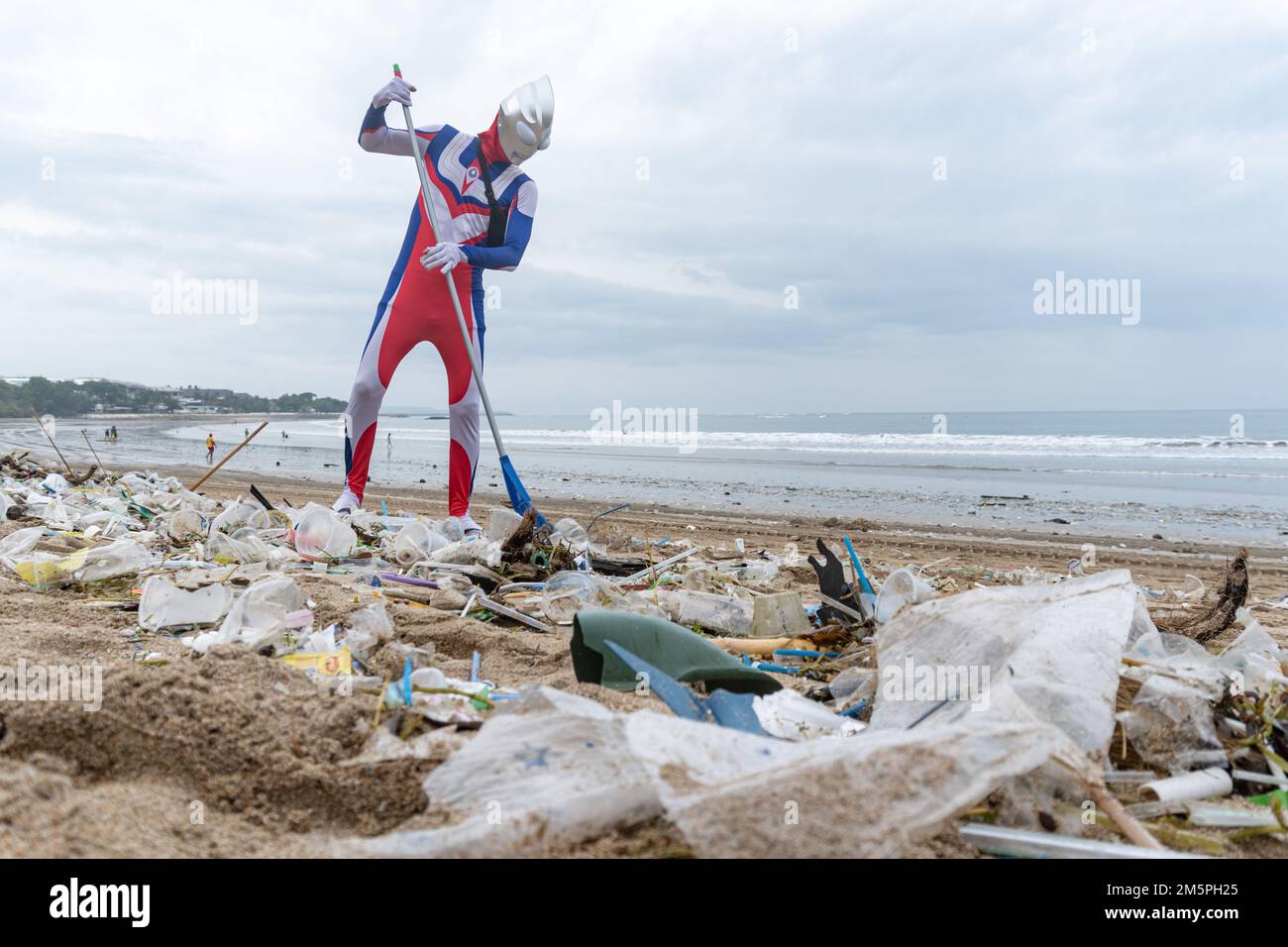 Bali, Indonesia. 30th Dec, 2022. A volunteer wearing a costume of the ...