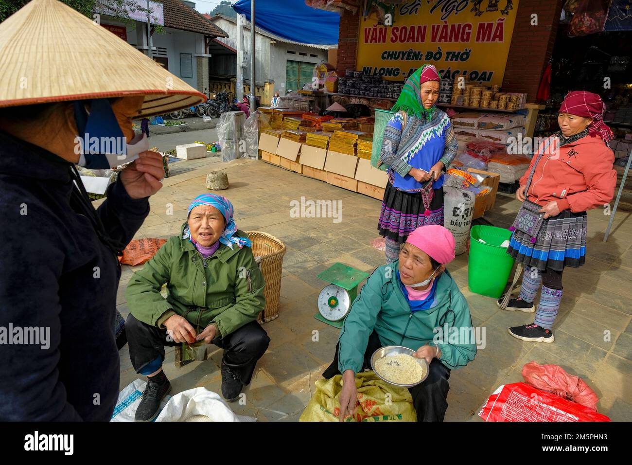 Bac Ha, Vietnam - December 18, 2022: Women selling rice in the Bac Ha ...