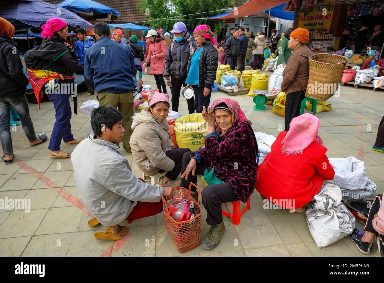 Bac Ha, Vietnam - December 18, 2022: Women selling rice in the Bac Ha ...