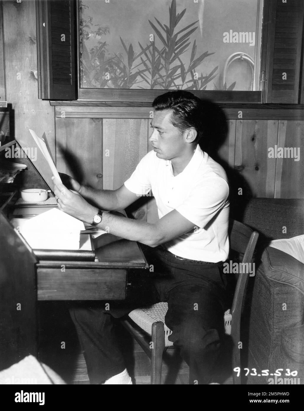 JOHN KERR at home publicity for RODGERS and HAMMERSTEIN's SOUTH PACIFIC ...