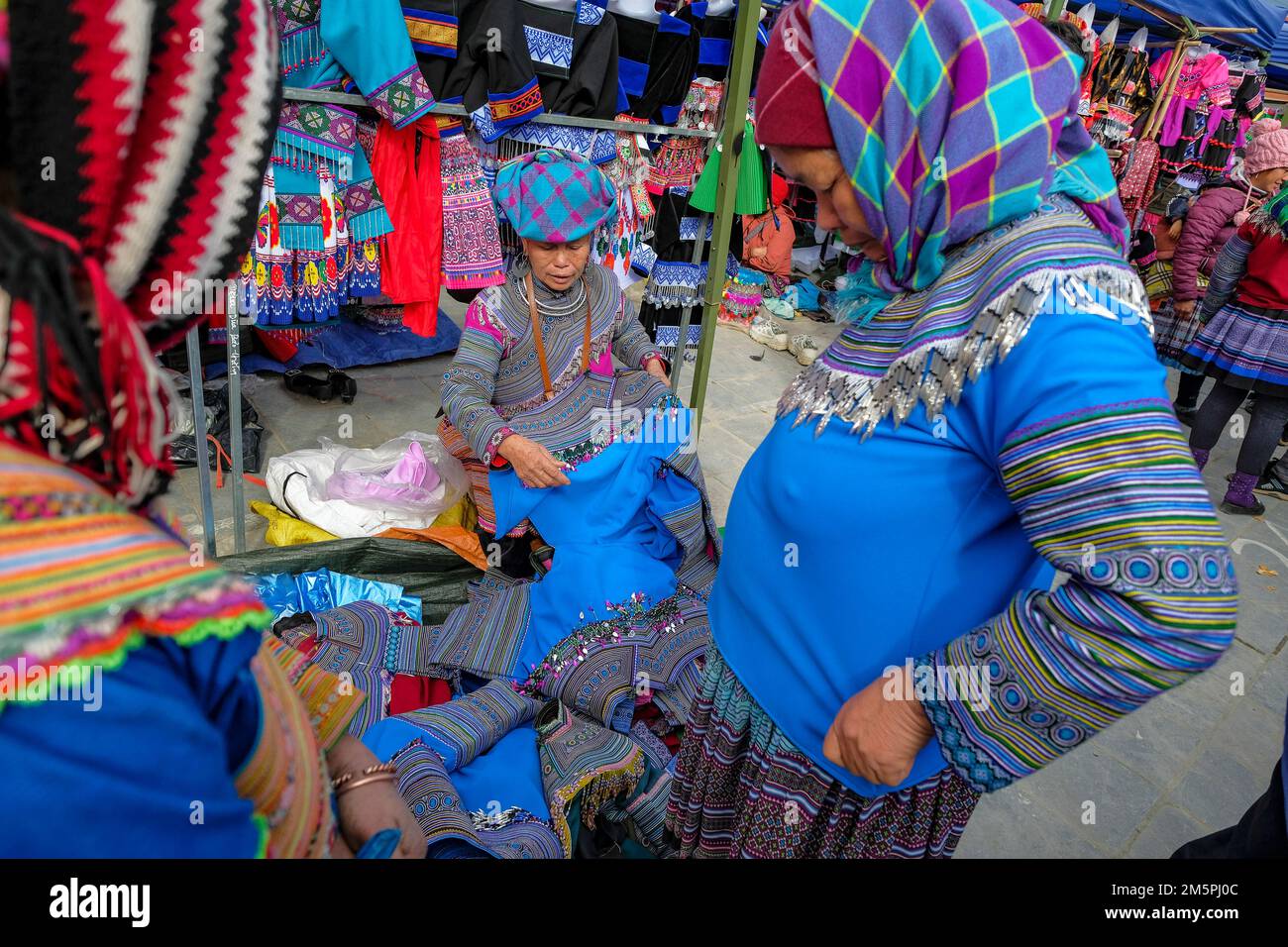 Bac Ha, Vietnam - December 18, 2022: A woman selling traditional ... Bac Ha, Vietnam - December 18, 2022: A woman selling traditional ...