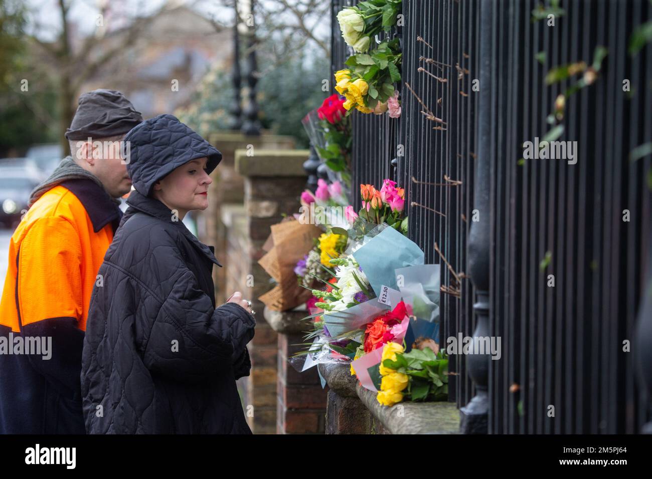 London, England, UK. 30th Dec, 2022. Floral tributes are seen outside ...